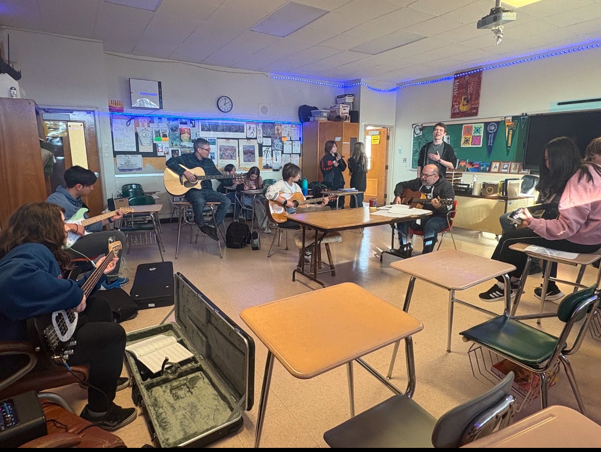 Faculty Spotlight: Mr. Millette and the Guitar Club – The Black and White